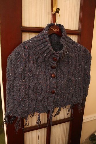 Ravelry: Cabled Cape with Fringe pattern by Irina Poludnenko
