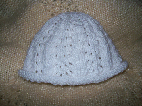 Ravelry: Feather & Fan Baby Hat with Rolled Brim pattern by Heidi Sunday