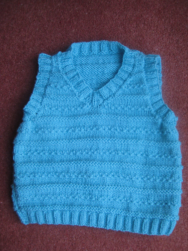 Ravelry: Design E - V - Neck Sweater & Tank pattern by Sirdar