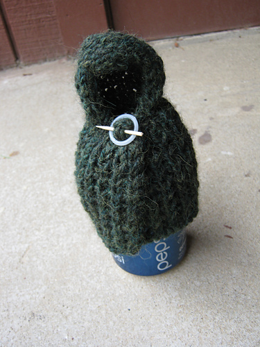 Ravelry: Ribbed Doll Cape pattern by Marika Tobak