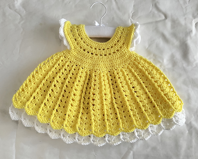 Ravelry: baby dress Lauren pattern by Frisian Knitting