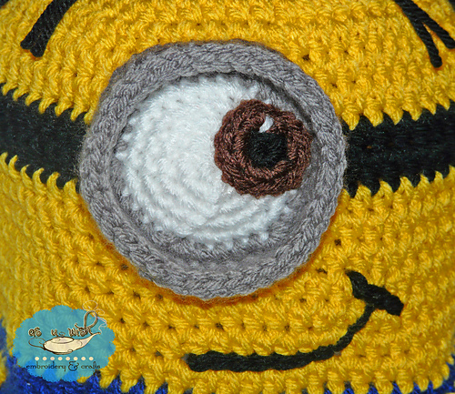 Ravelry: 3-D Minion Ear Flap Hat pattern by Yvette Manley