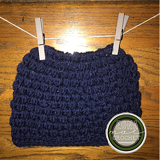 Ravelry: Mama's Messy Bun Beanie pattern by Leslie DeHart