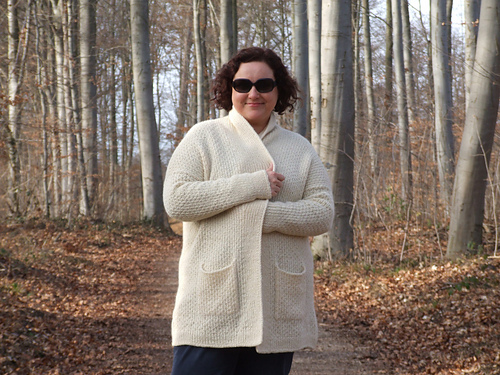 Does anyone know of a pattern for a sweater similar to this? It's ...