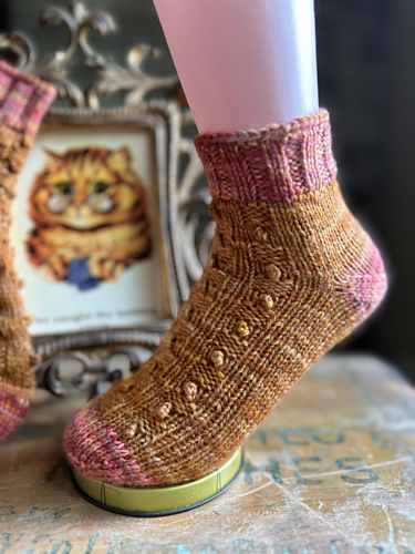 Ravelry: Cozy Bobble Socks pattern by Andrea Yetman