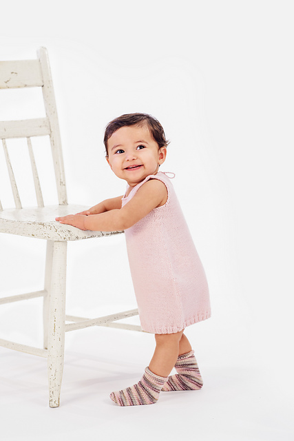 Ravelry: Roundabout Romper and Sweetie Socks pattern by Sarah Smuland