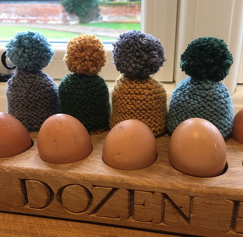 Ravelry: Pom Pom Egg Cosy pattern by Patricia Evans