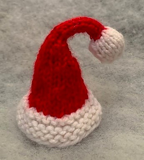 Ravelry: One Piece Christmas Santa Hat & Scarf pattern by Caroline Watton