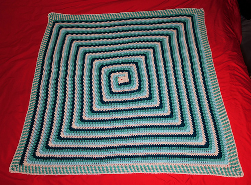 Ravelry: Square Spiral Blanket with Border pattern by CinnamonWolf