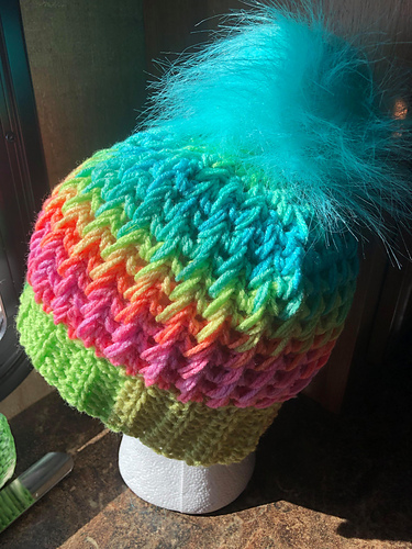 Ravelry: Stacked Feather Beanie pattern by Kris Hopper