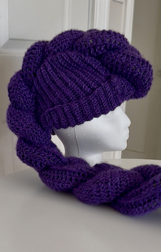 Ravelry: The Rumi Braid Beanie pattern by Jonathon Garrity