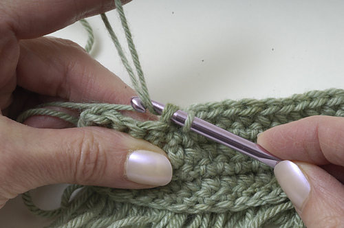 Ravelry: Loop-de-loop Pillow pattern by Sharon Silverman