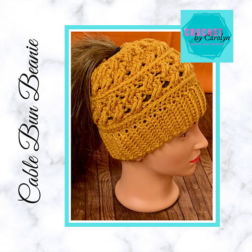 Ravelry: Cable Bun Beanie pattern by Carolyn Schugel