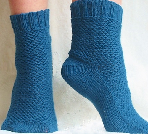 Ravelry: Mermaid Tails Socks pattern by Deborah Tomasello