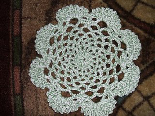 Ravelry: Lacy Petals Dishcloth pattern by April Moreland