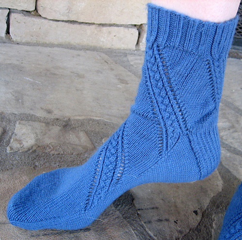 Ravelry: Braided Swirl Socks pattern by Emily Wood
