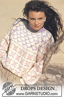 Ravelry: 13-19 Jumper with rose pattern pattern by DROPS design