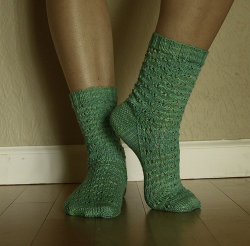 Ravelry: Petunia Dursley's Double Eyelet Socks pattern by Erica Lueder