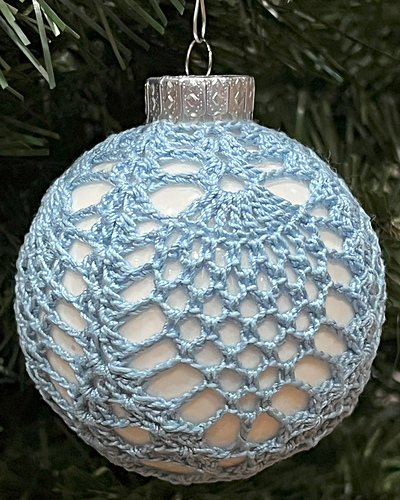 Ravelry: Pineapple Lace Ornament Cover pattern by Emma Garside