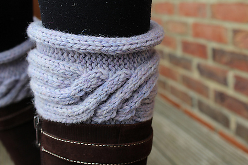 Ravelry: Carlota Cabled Boot Toppers pattern by Emma Sadler