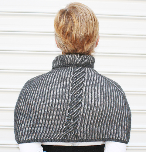 Ravelry: gray reversible cabled capelet pattern by Evelyn Siatra
