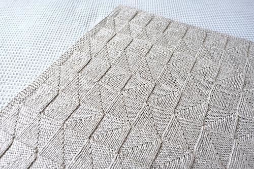 Ravelry: Tessellating Triangles Baby Blanket pattern by Georgia Farrell