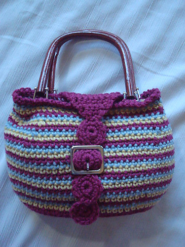 Ravelry: Yo-Yo Purse pattern by Ellen Gormley