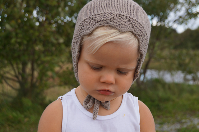 Ravelry: Eva bonnet with lace edge pattern by Mette Harbo