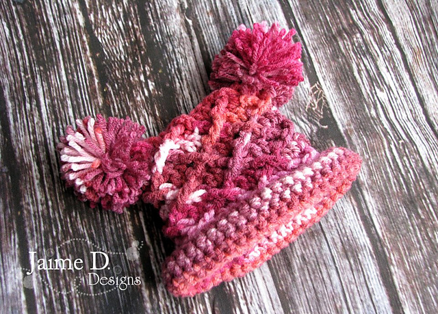 Ravelry: Woven Double Pom pattern by Desiree Martinez