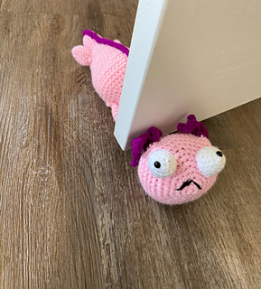 Ravelry: Squished Axolotl Door Stop pattern by The Knotted Dinosaur