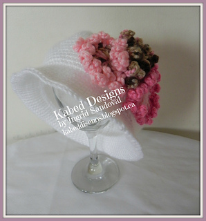 Ravelry: Summer Blossoms Hat pattern by Ingrid Sandoval