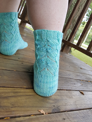 Ravelry: Tidal Waves Socks pattern by There She Knits