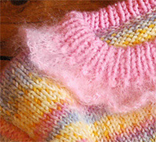 Ravelry: Jolee Pink Ruffle Sweater pattern by Erin Krantz