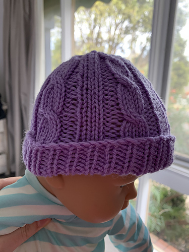 Ravelry: Cabled Baby Hat pattern by marianna mel