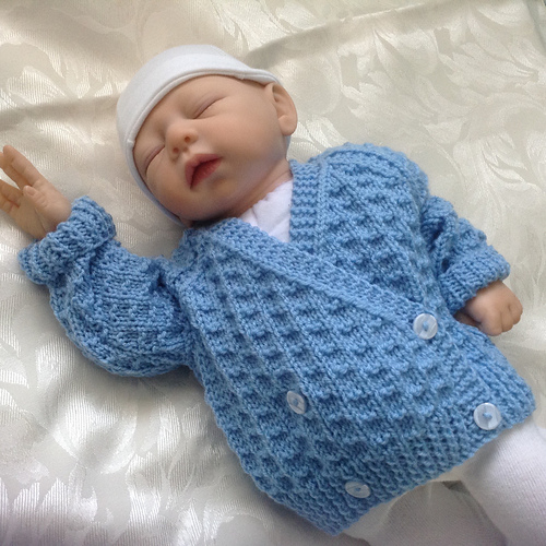 Ravelry: Crossover Baby Cardigan pattern by Jacqueline Gibb