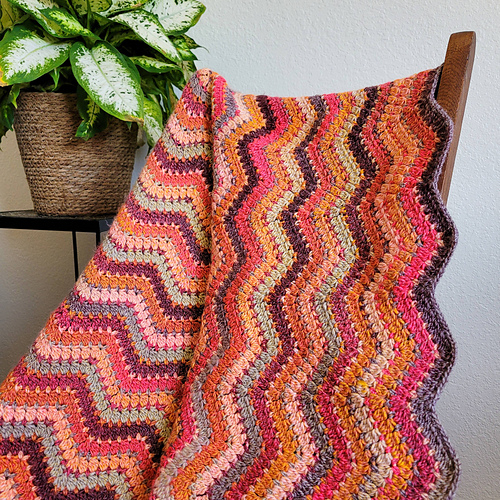 Ravelry: Huzzah Cluster Ripple Blanket pattern by Jennifer Olivarez