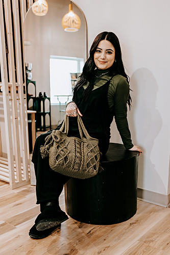 Ravelry: Charlene Cabled Crochet Purse pattern by Jennifer Renaud