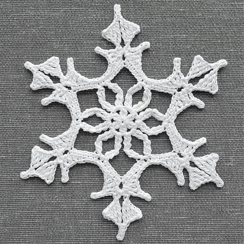 Ravelry: East Flame Snowflake pattern by Jessica Wifall