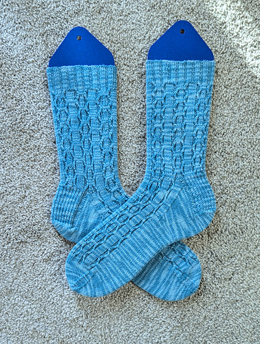 Ravelry: Sapphire Martini Socks pattern by KnittingPirate