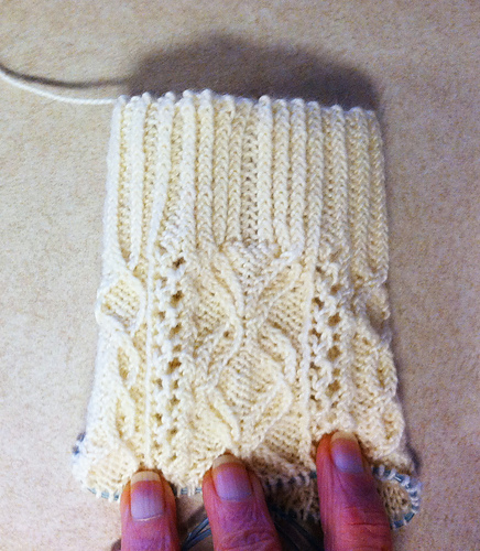 Ravelry: Vernal Snow Twisted Stitch Socks pattern by Suzanne Bryan