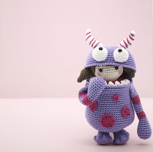 Ravelry: Little Ella in her monster suit pattern by Erinna Lee