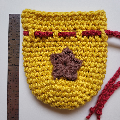Ravelry: Drawstring Money Bag pattern by Kristin Van Solkema