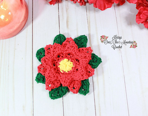 Ravelry: Poinsettia Towel Topper pattern by Kris Moore