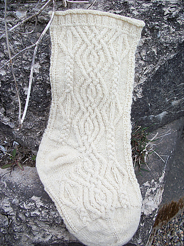 Ravelry: Cabled Christmas Heirloom Stocking pattern by Jeanne Whiteside