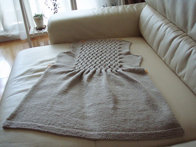 Ravelry: Handknitlife's Smocked Cable Coat