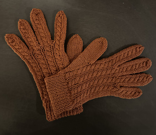 Ravelry: Cabled Men’s Gloves pattern by Logan McLean