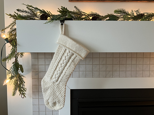 Ravelry: Cozy Cabled Stocking pattern by Ksenia Naidyon