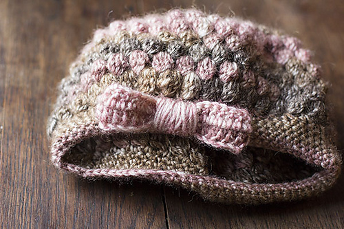 Ravelry: Puff stitch hat with bow pattern by Mon Petit Four