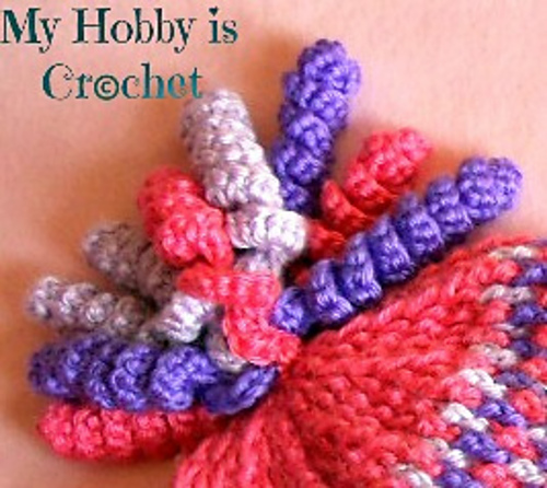 Ravelry: Octopus Curlicue Pompom pattern by Kinga Erdem