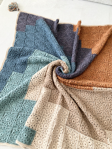 Ravelry: Autumn Swirl Blanket pattern by Mallory Krall